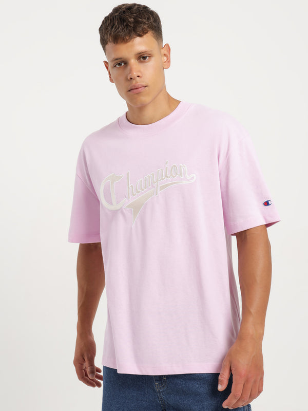 Champion Heritage Cursive Logo T-Shirt in Pink Posy Pink | Glue Store