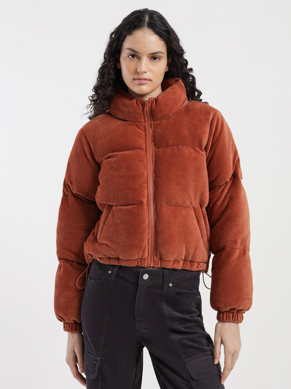 Beyond her Tyler Cord Puffer Jacket in Rust Rust | Glue Store
